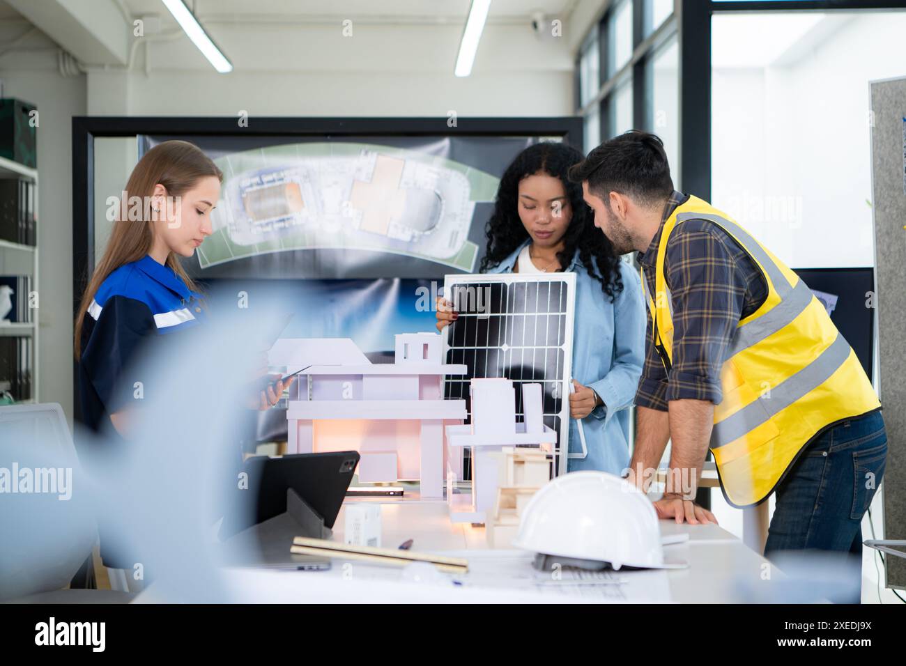 Engineers, architects, and designers collaborate to design a building ...