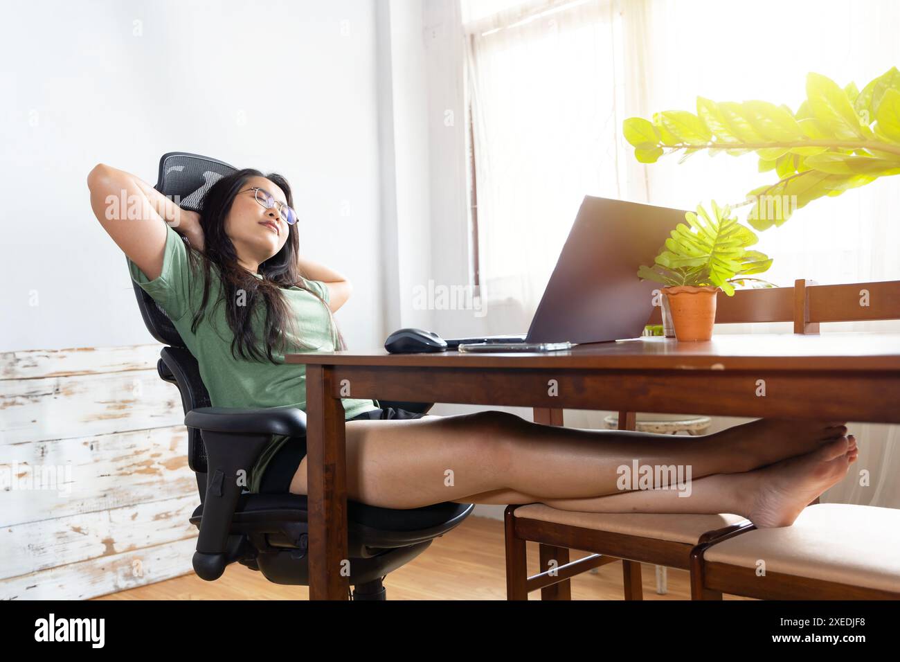 Stylish, pretty, charming, nice economist resting on chair with close ...
