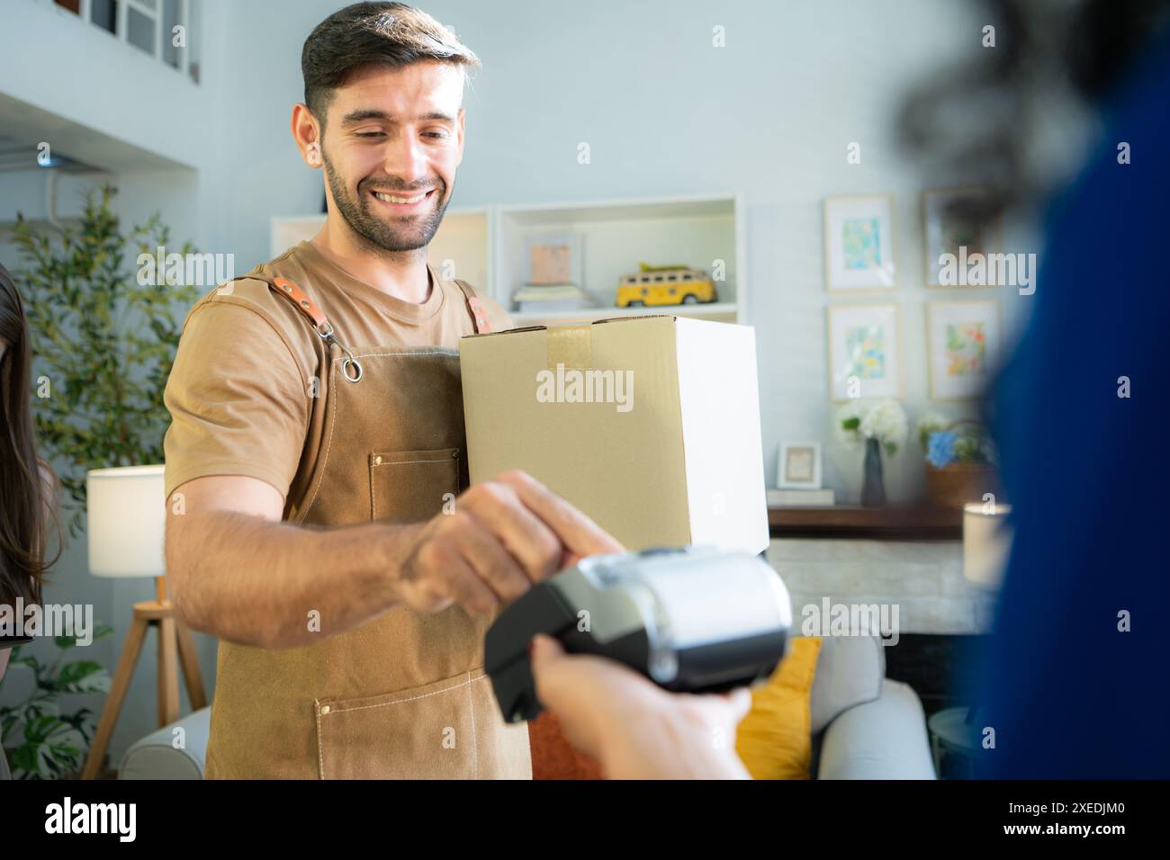 Small business owner sign to receive the product on board from the ...