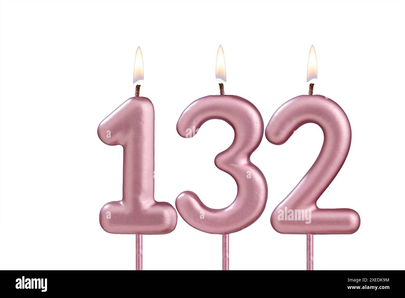 Lit birthday candle - Candle number 132 on white background Stock Photo ...
