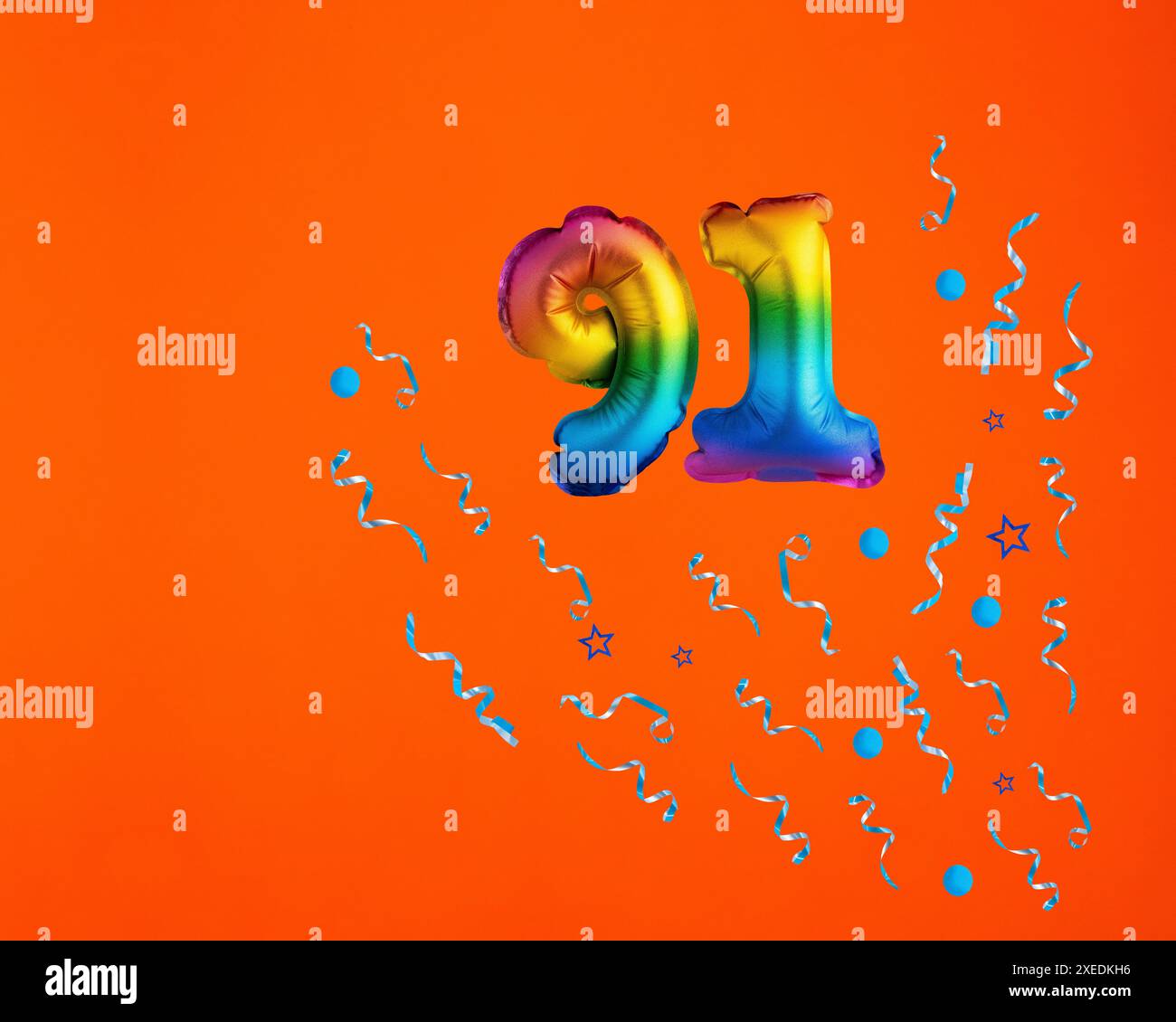 Confetti explosion with number 91 balloon - Celebration on orange ...