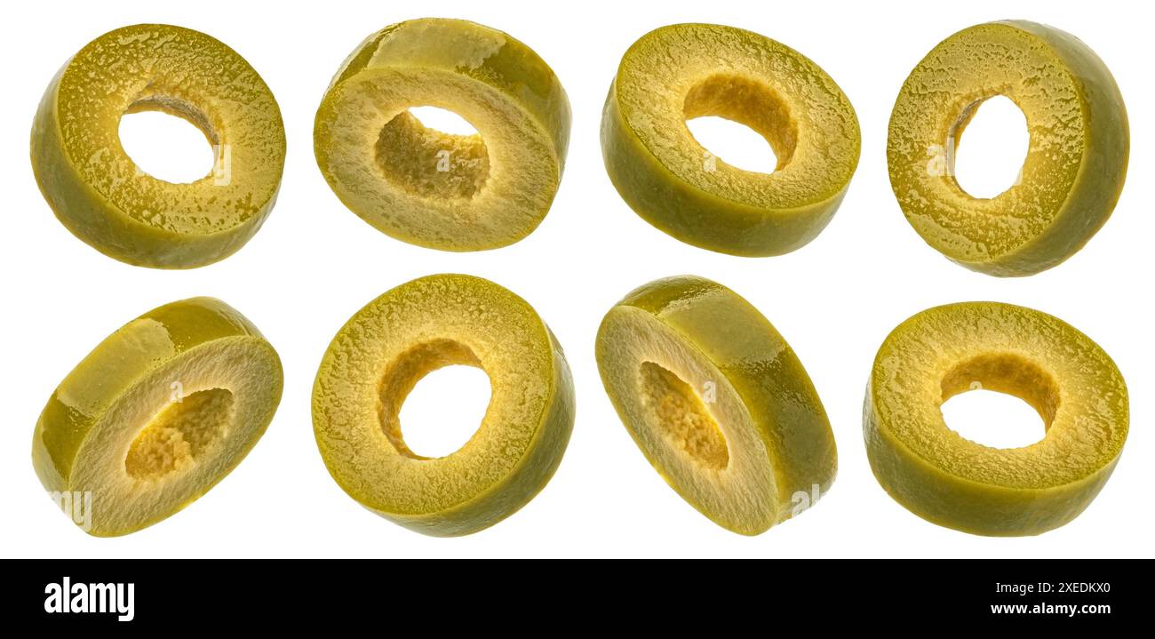 Green olive slices isolated on white background Stock Photo - Alamy