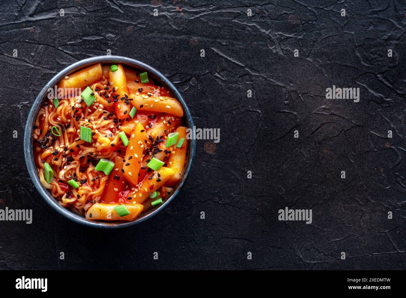 Rabokki, tteokbokki or topokki with ramen, Korean street food, spicy ...
