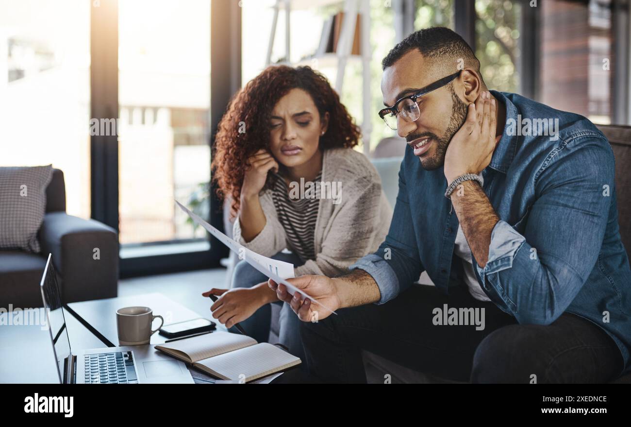 Stress, financial paperwork or couple with invoice, finance documents ...