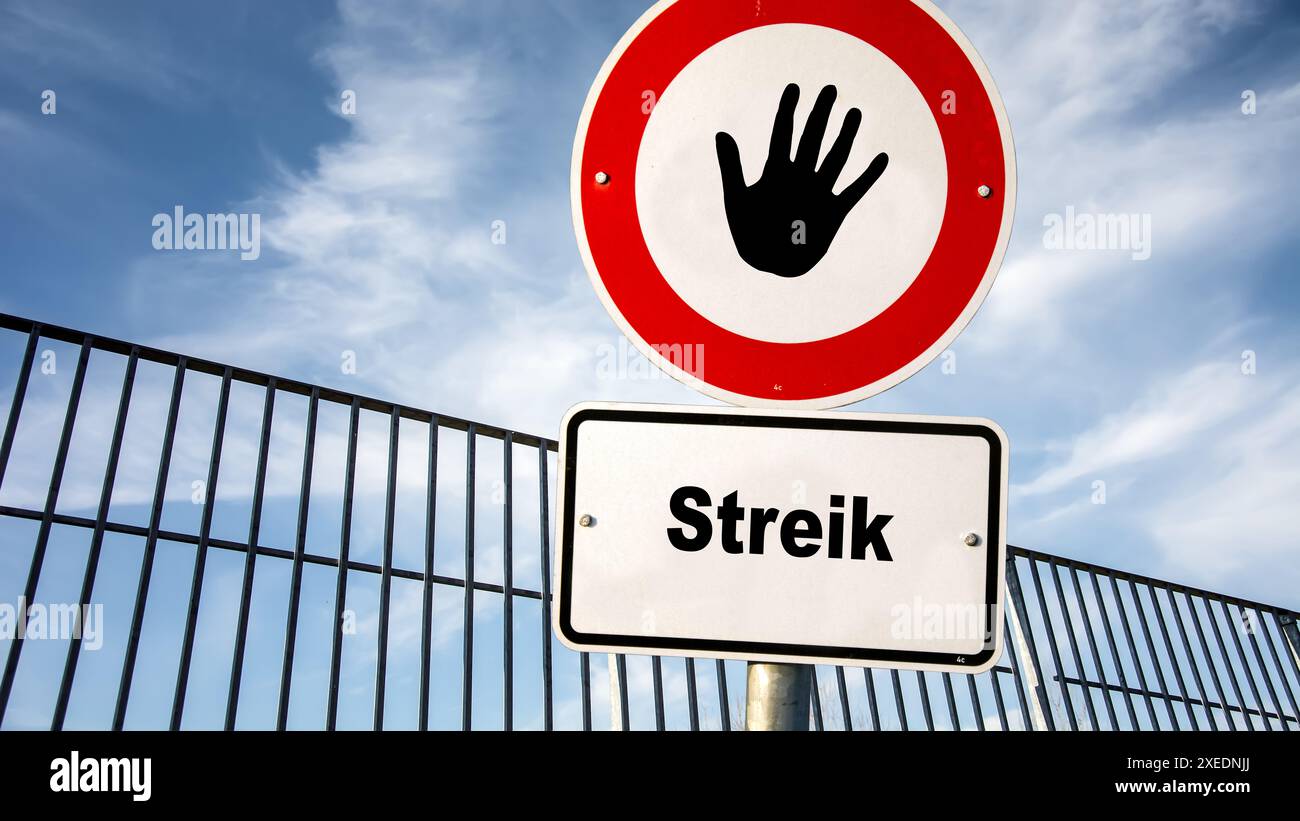 Signposts the direct way to Agreement versus Strike Stock Photo - Alamy