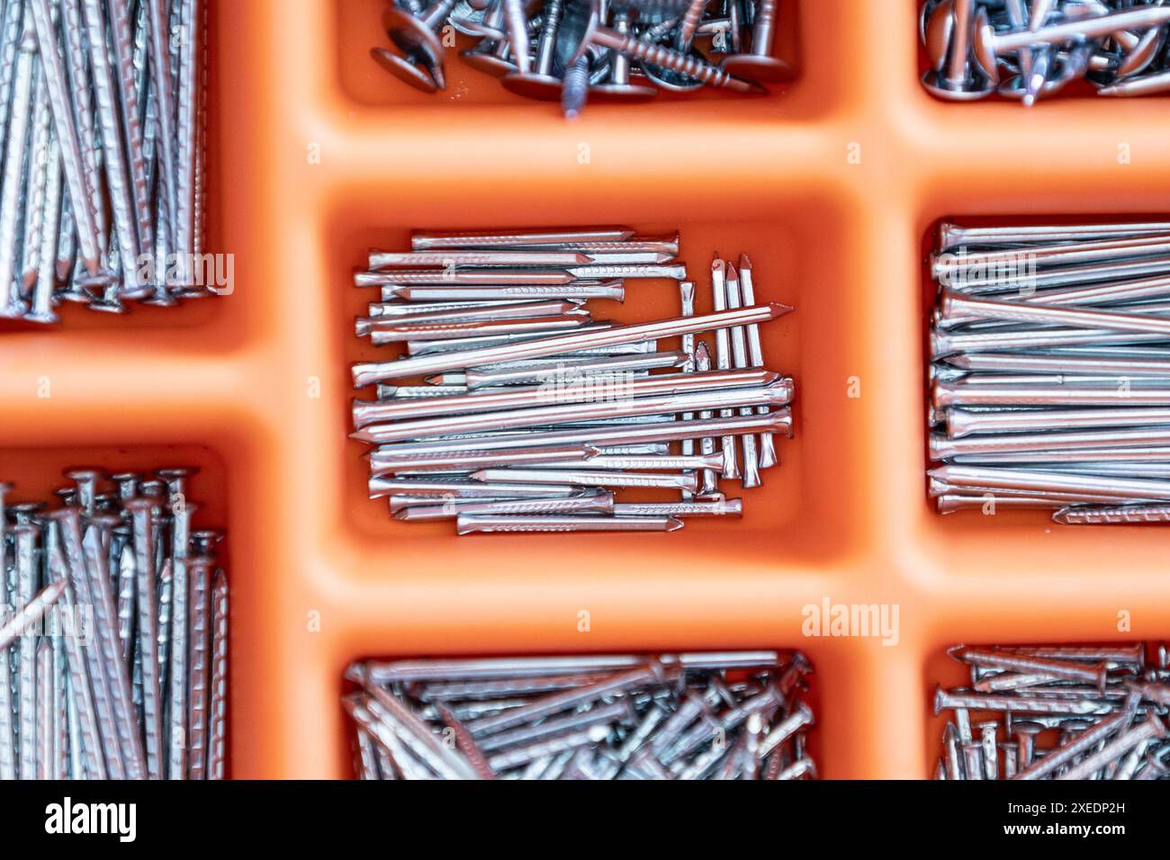 Collection of nails, screws and bolts in plastic box Stock Photo - Alamy