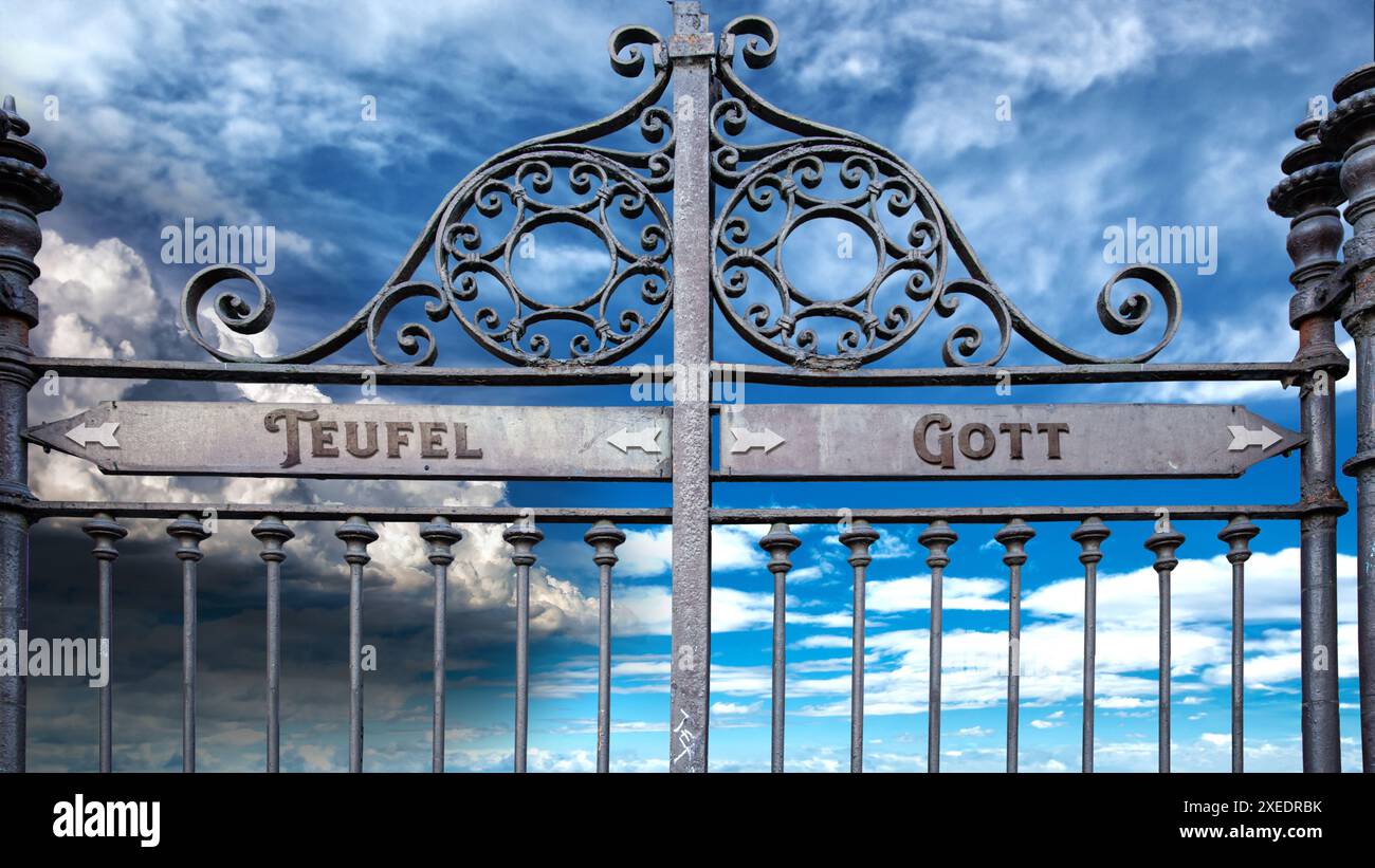 Signposts the direct way to God versus Devil Stock Photo - Alamy