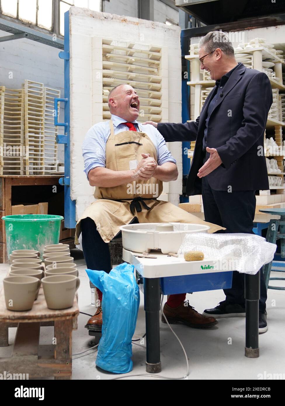 Labour leader Sir Keir Starmer speaks with potter Keith Brymer Jones ...