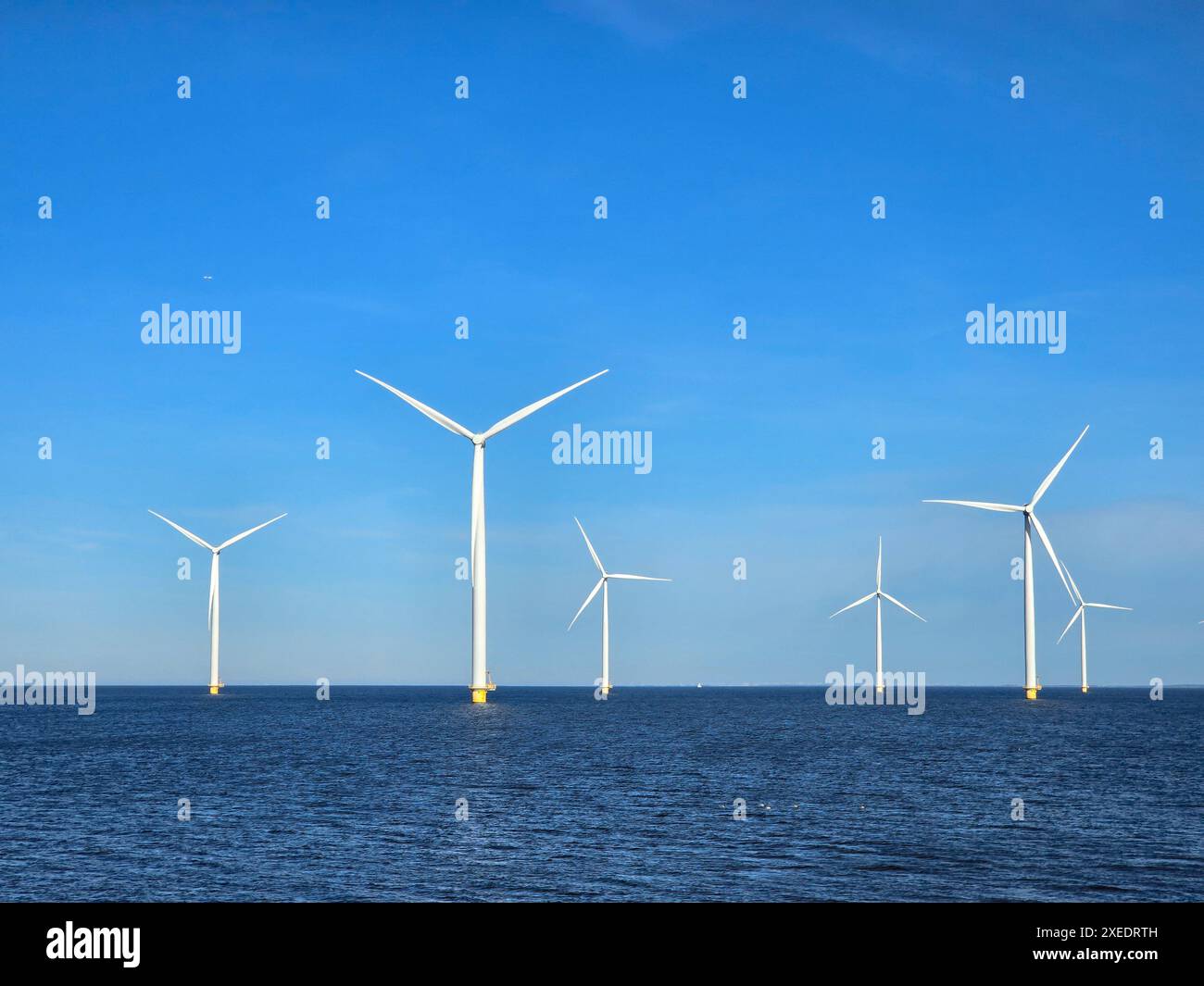 Windmill park in the ocean, drone aerial view of windmill turbines at ...