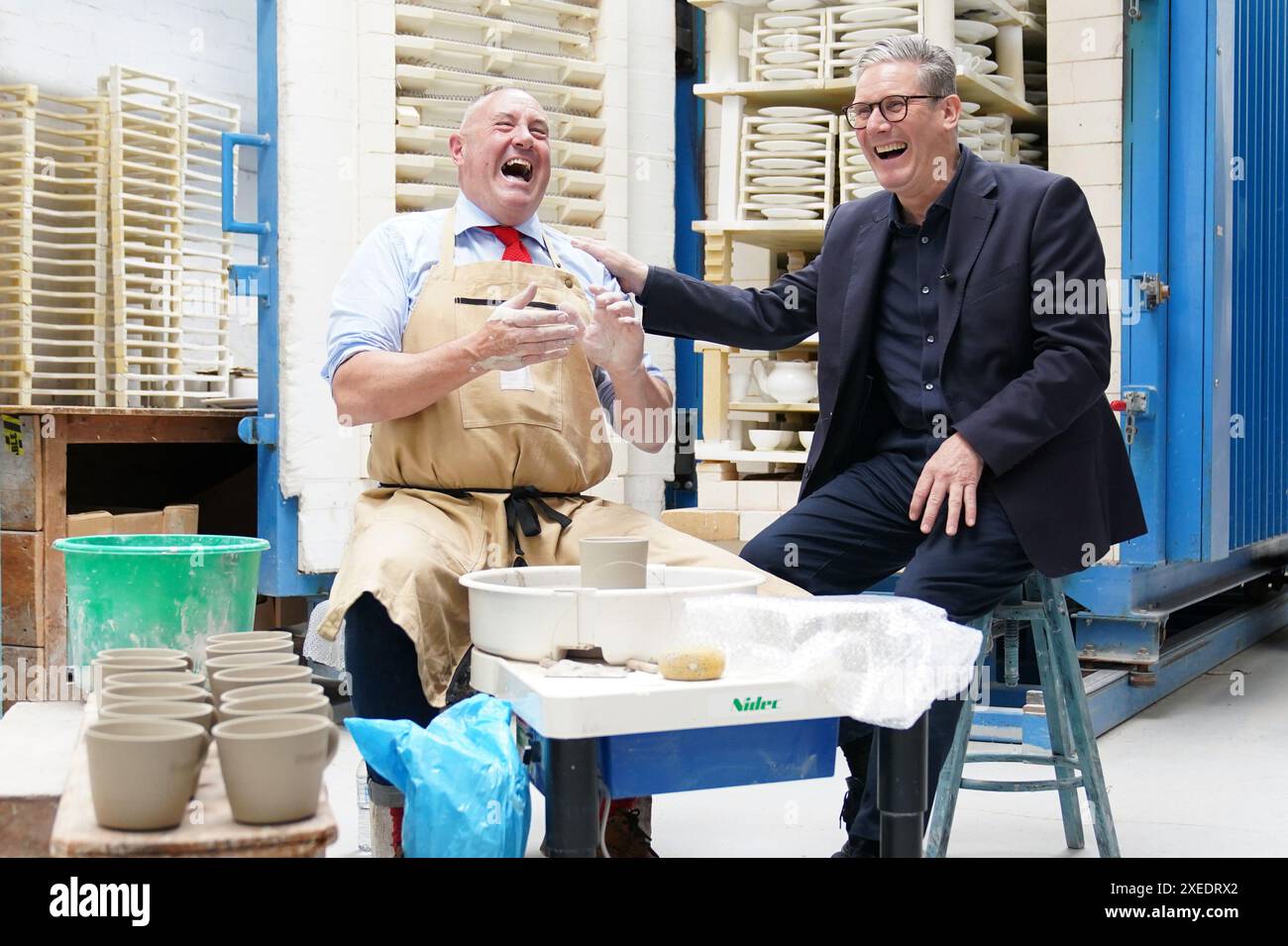 Labour leader Sir Keir Starmer speaks with potter Keith Brymer Jones ...