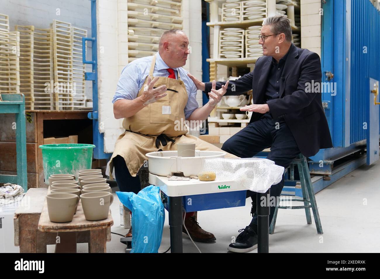 Labour leader Sir Keir Starmer speaks with potter Keith Brymer Jones ...