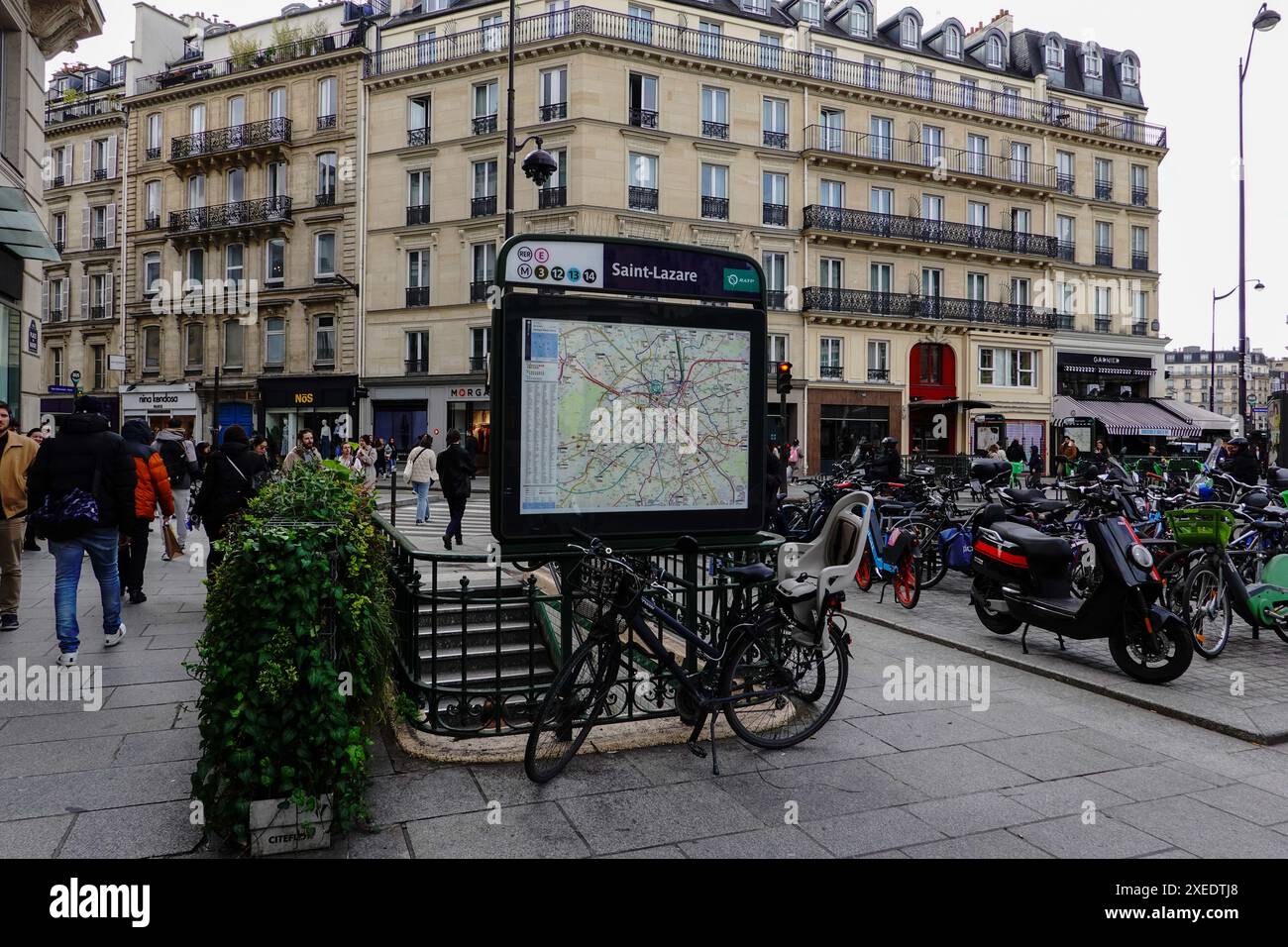 Entry into the Saint-Lazare Metro Station with area map and lots of ...
