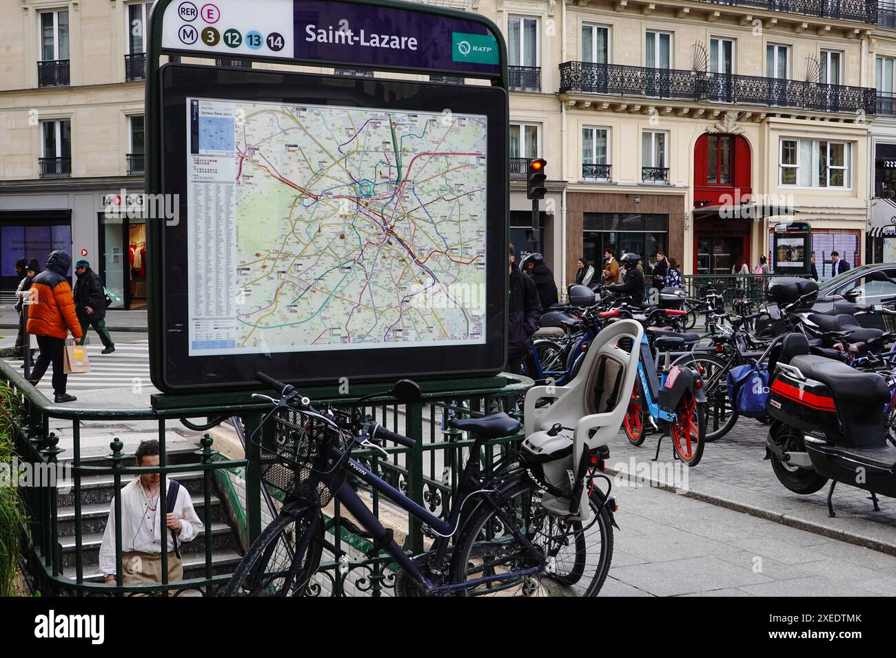 Entry into the Saint-Lazare Metro Station with area map and lots of ...
