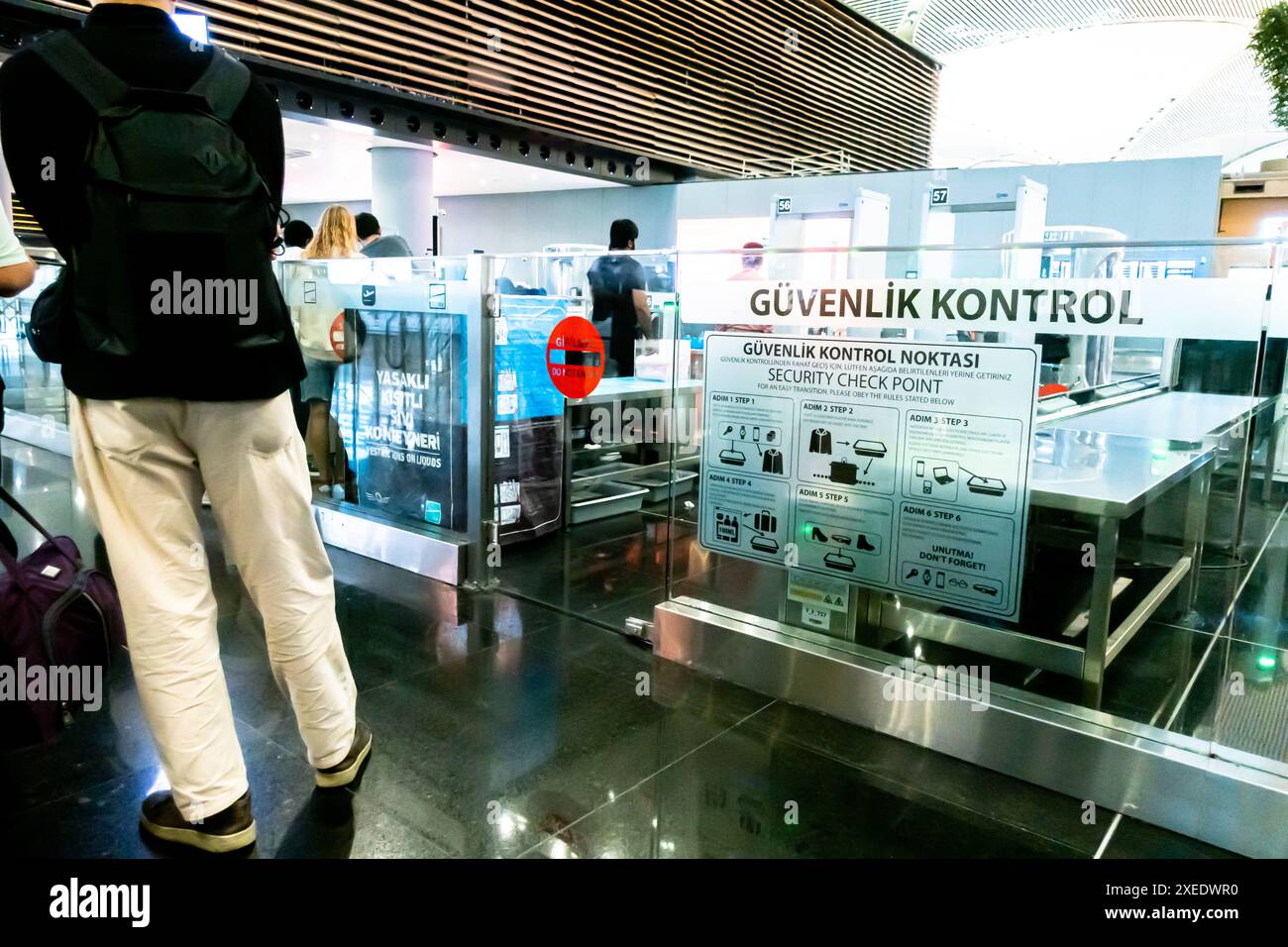 Security check point, bilingual sign Turkish English, Istanbul airport ...