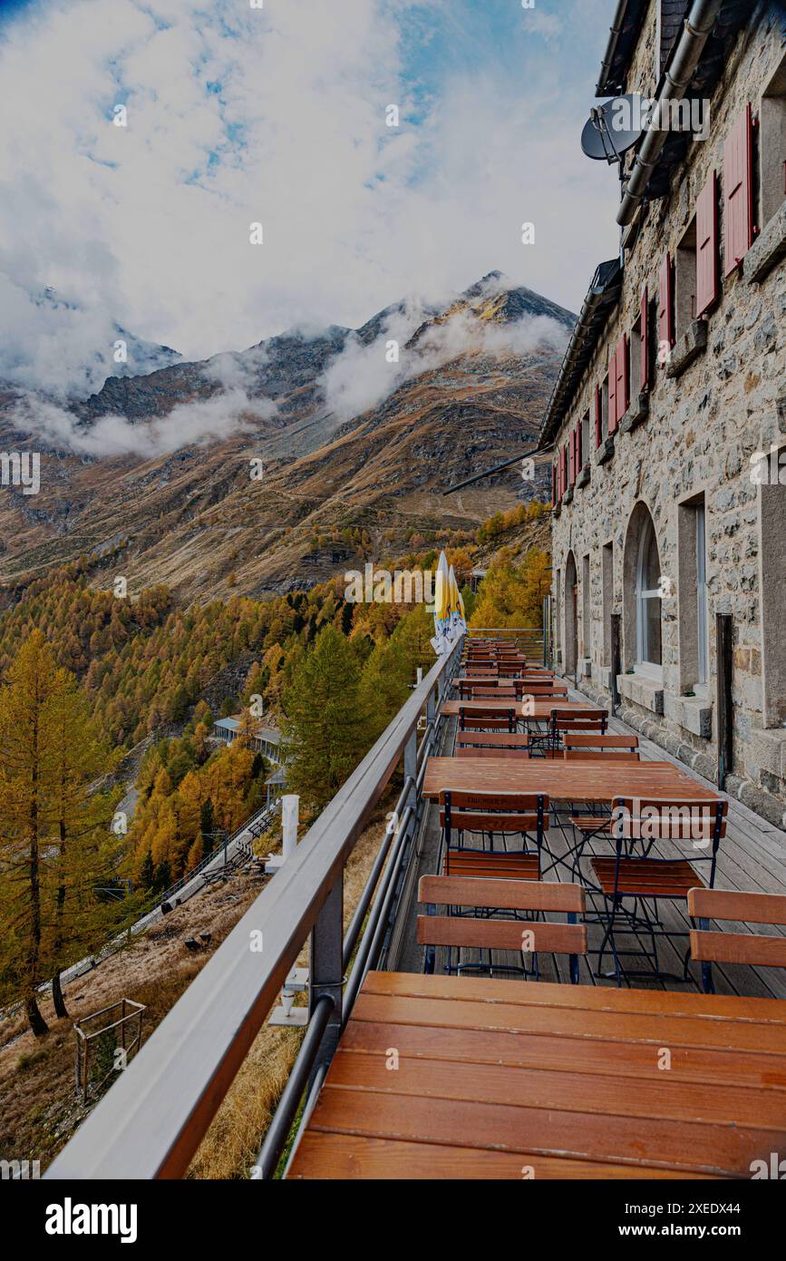 Outdoor tables at Restaurant Alp Grum along the Bernia Express train ...