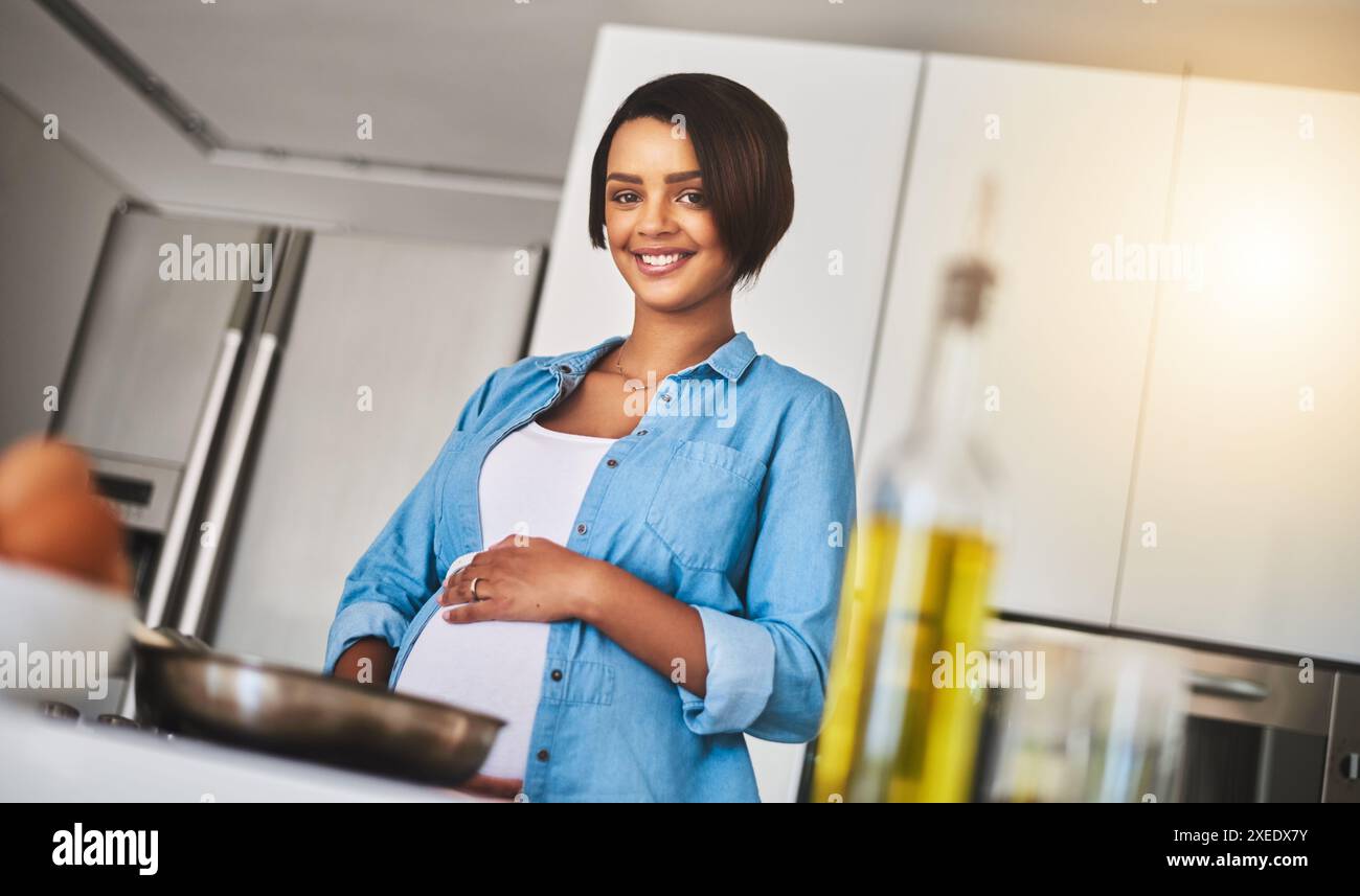 Portrait, cooking and pregnant woman in kitchen in home for healthy ...