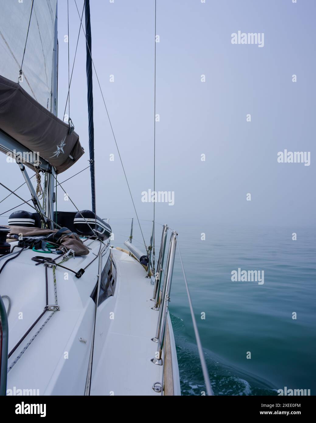 A modern sailing yacht, sailing on the south coast of England, UK. The ...