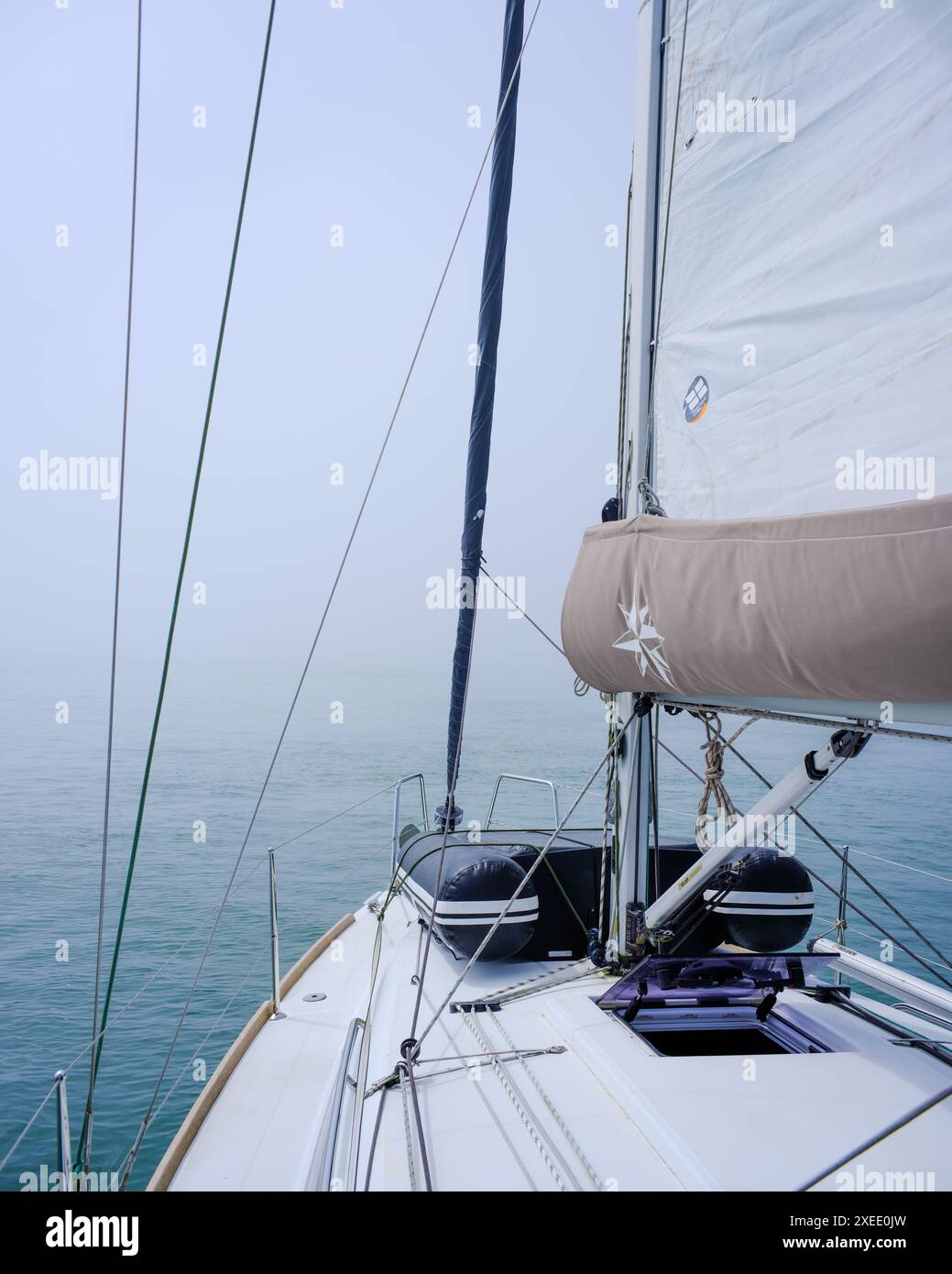 A modern sailing yacht, sailing on the south coast of England, UK. The ...