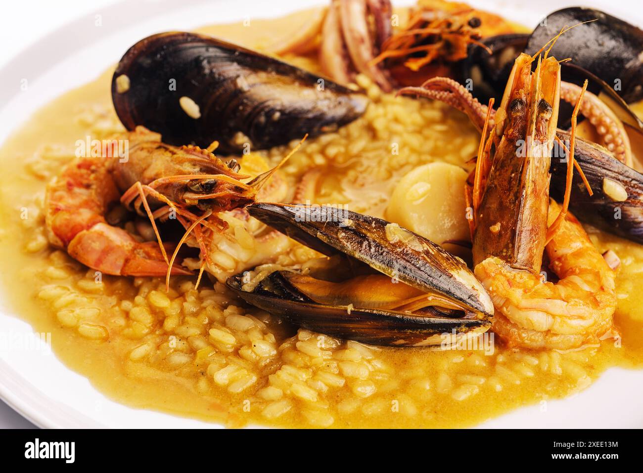 Seafood risotto with mussel shrimp and squid Stock Photo - Alamy