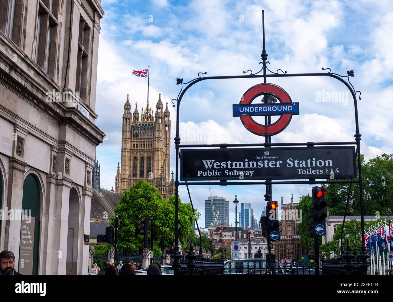 Westminster tube underground station with Houses of Parliament behind ...