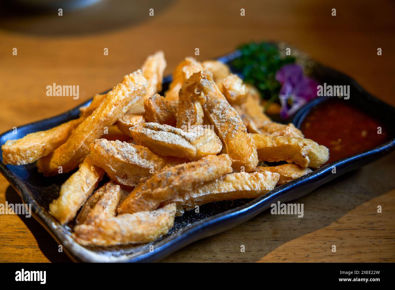 A plate of crispy and delicious Taiwanese snacks, sweet and spicy Stock ...