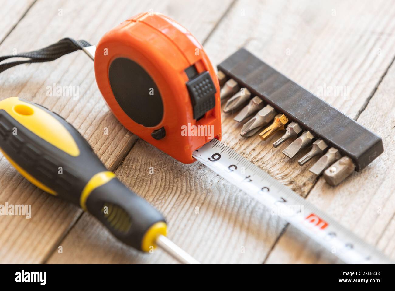 Measuring Tape Tool and screwdriver bits set Stock Photo - Alamy