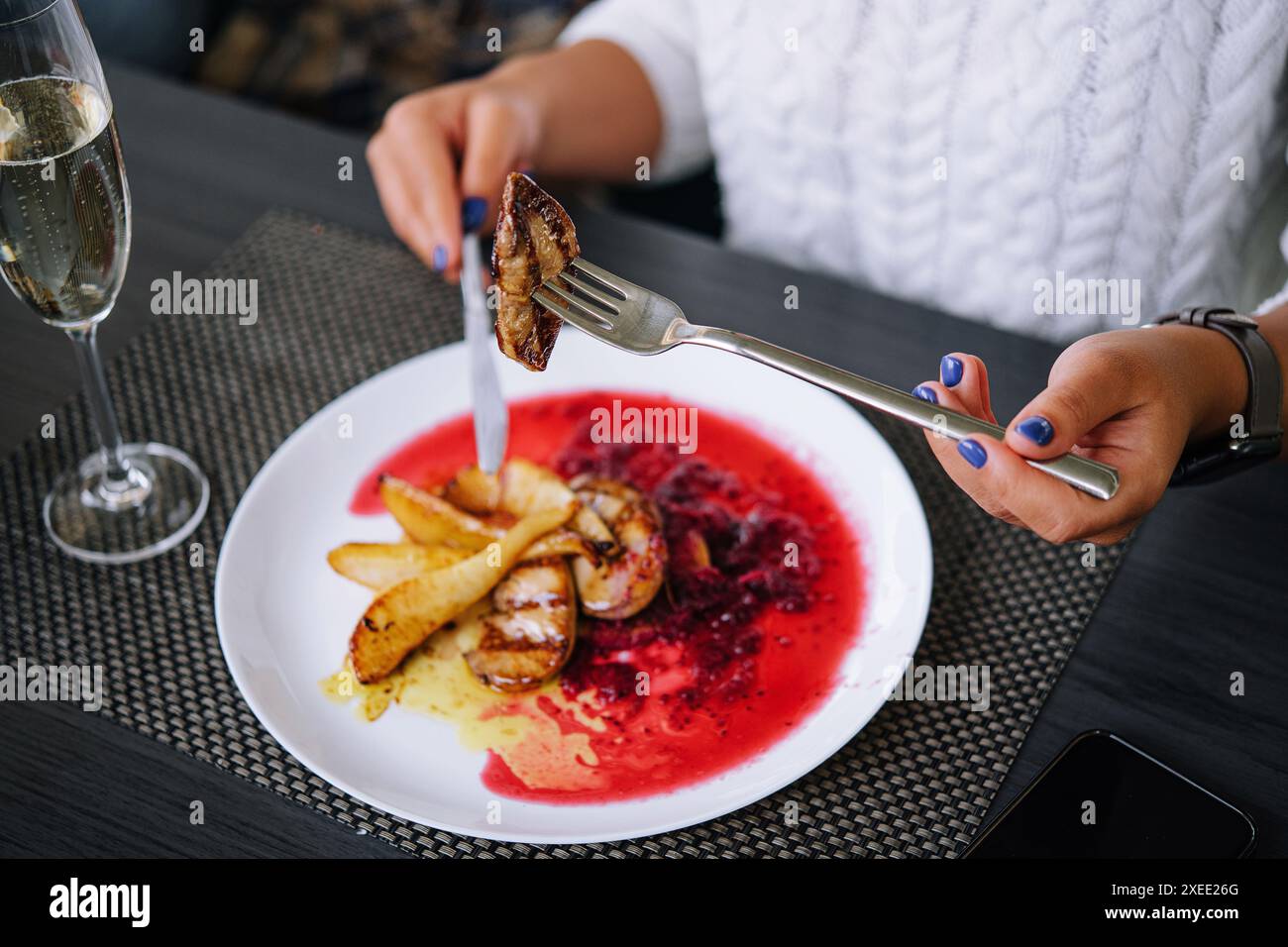 Woman eating steak dinner hi-res stock photography and images - Alamy