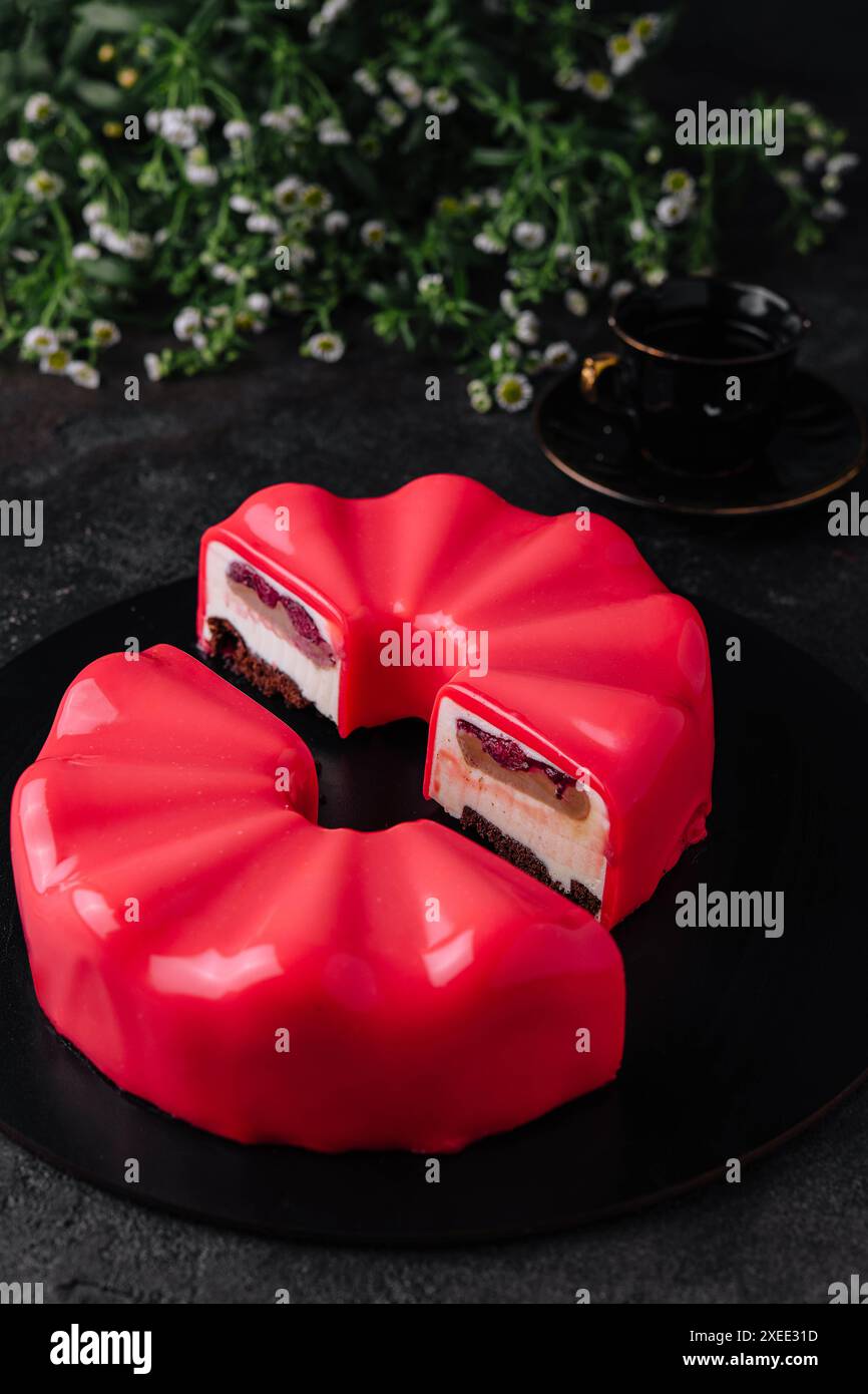 Multi layered raspberry mousse cake on plate Stock Photo - Alamy