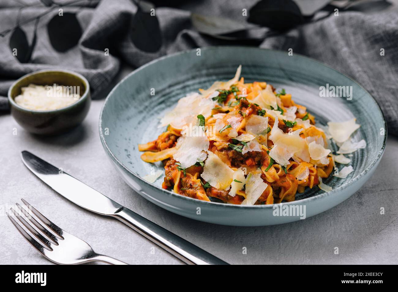 Tagliatelle with ragu bolognese sauce with parmesan Stock Photo - Alamy