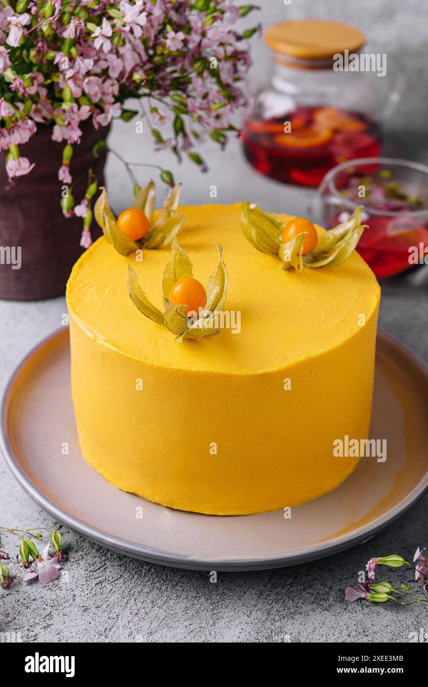 Tasty mango mousse cake on plate Stock Photo - Alamy