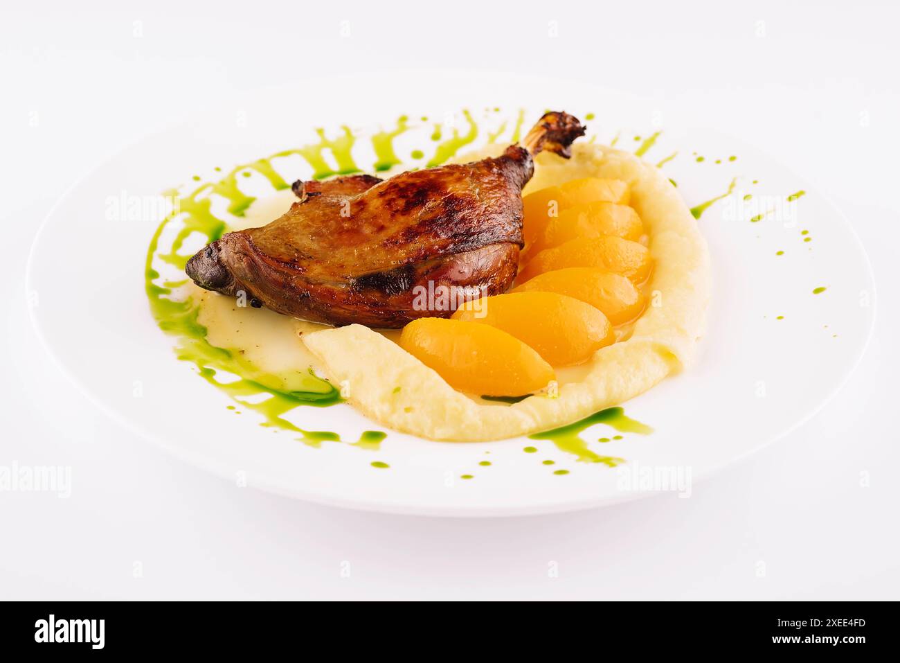 duck leg confit with mashed potatoes Stock Photo - Alamy