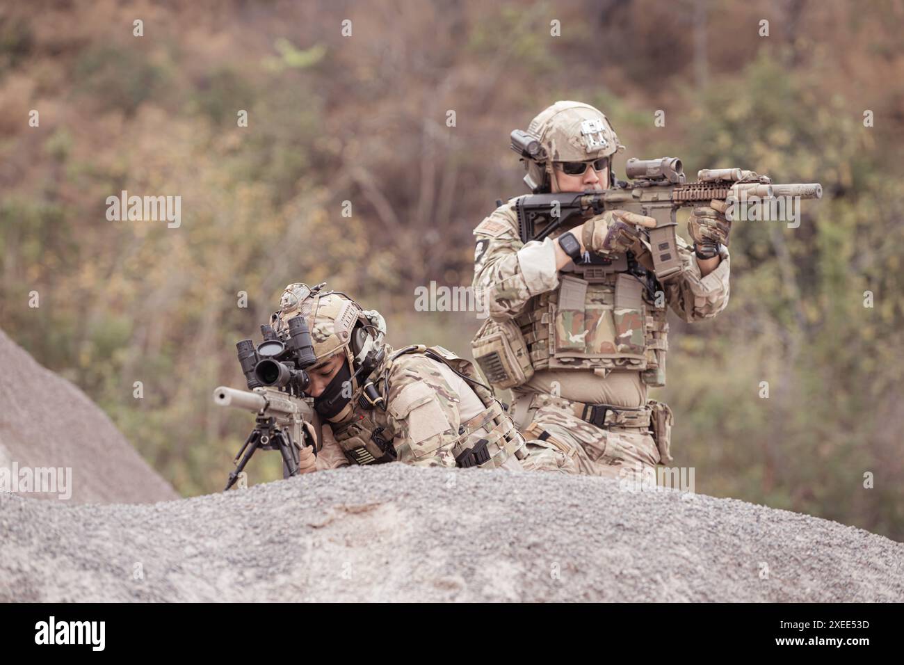 In forest soldiers camouflage uniforms hi-res stock photography and ...