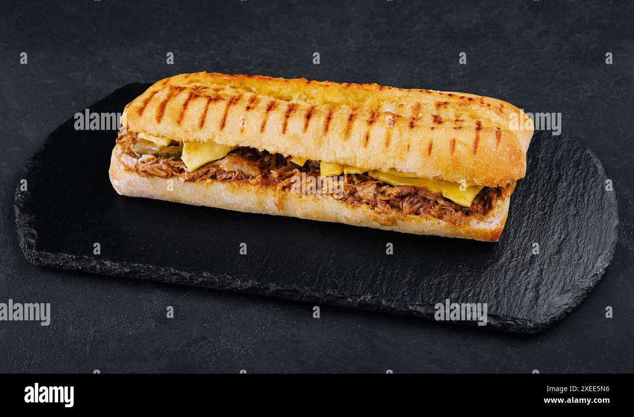 long sandwich with chicken, cucumbers and cheese Stock Photo - Alamy