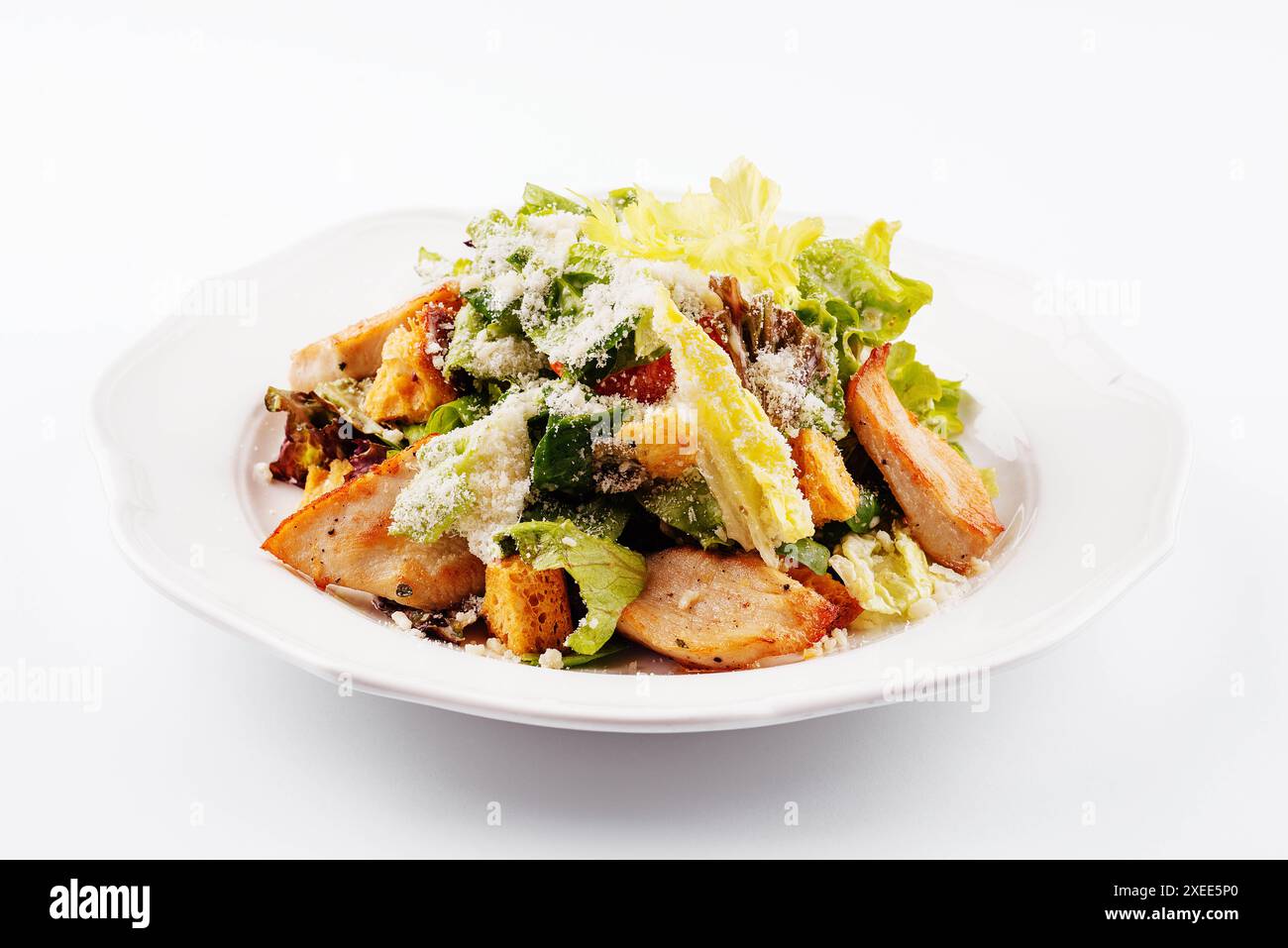 Traditional classic Caesar salad in white plate Stock Photo - Alamy