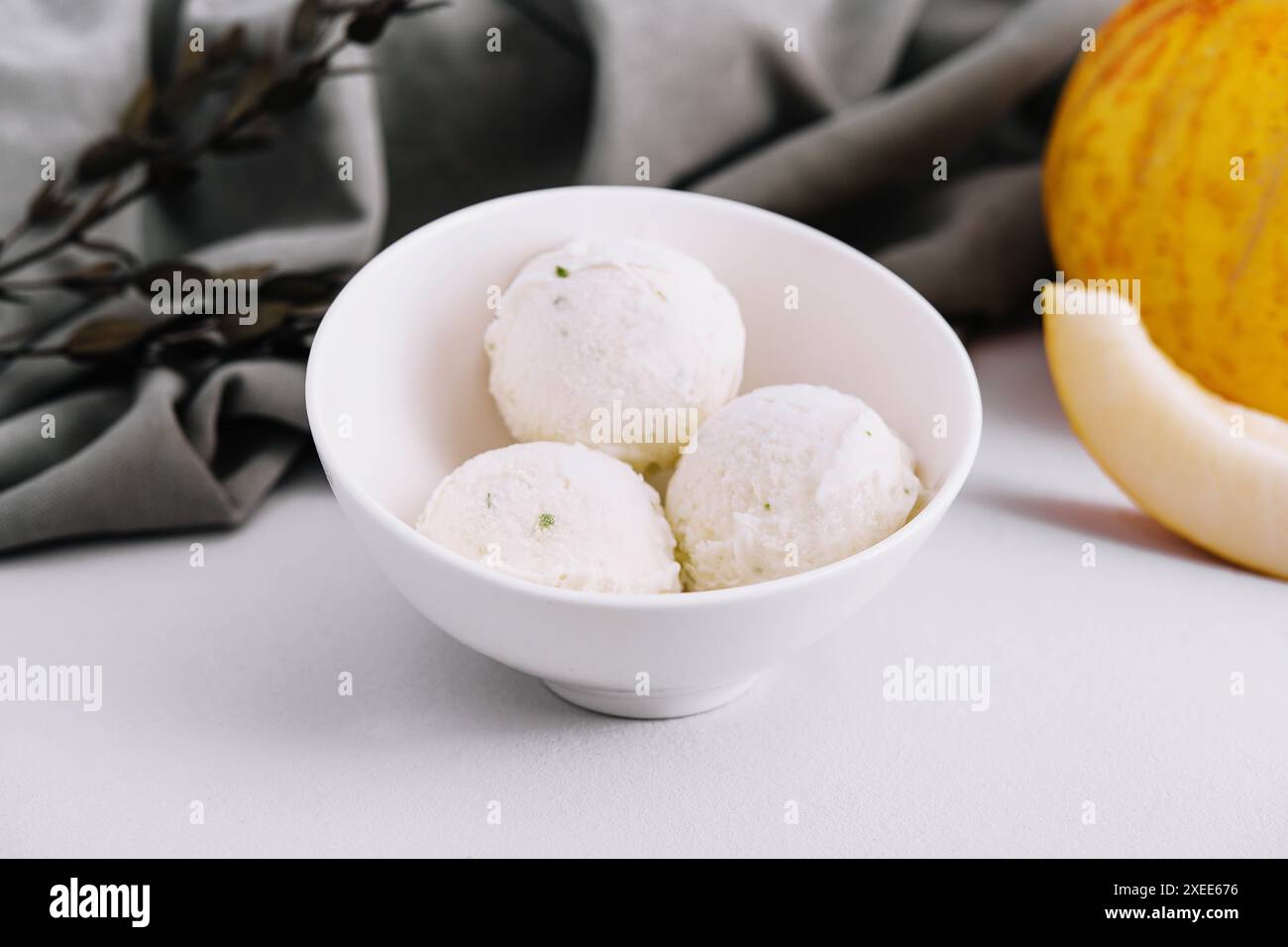 melon ice cream scoops in bowl Stock Photo - Alamy