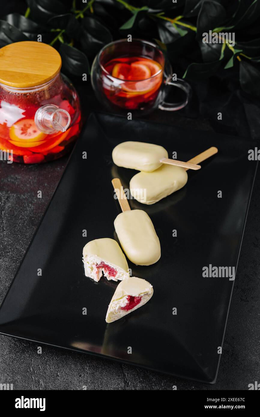 dessert from ice cream lolly with white chocolate coating Stock Photo ...