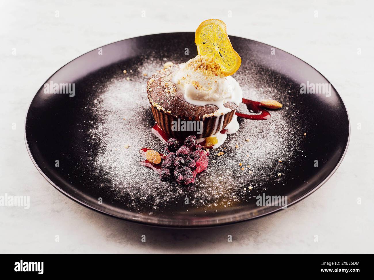 Chocolate fondant with ice cream balls Stock Photo - Alamy