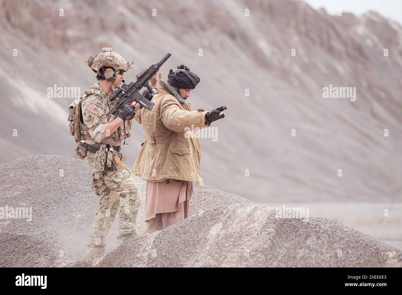 A Taliban soldier stands with a machine gun, Raise hands in surrender ...