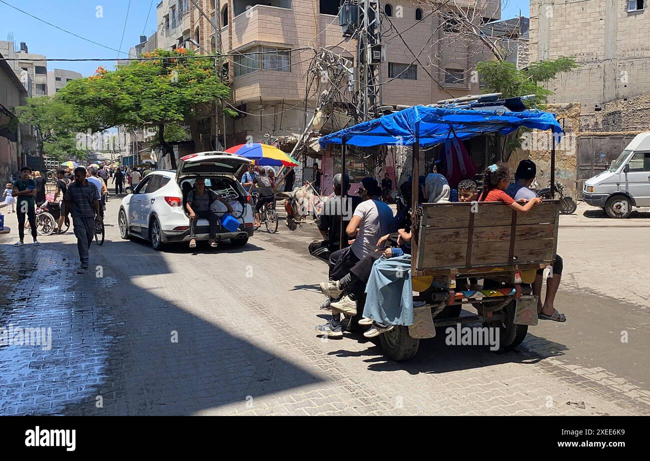 Palestinians flee their homes following an Israeli military operation ...