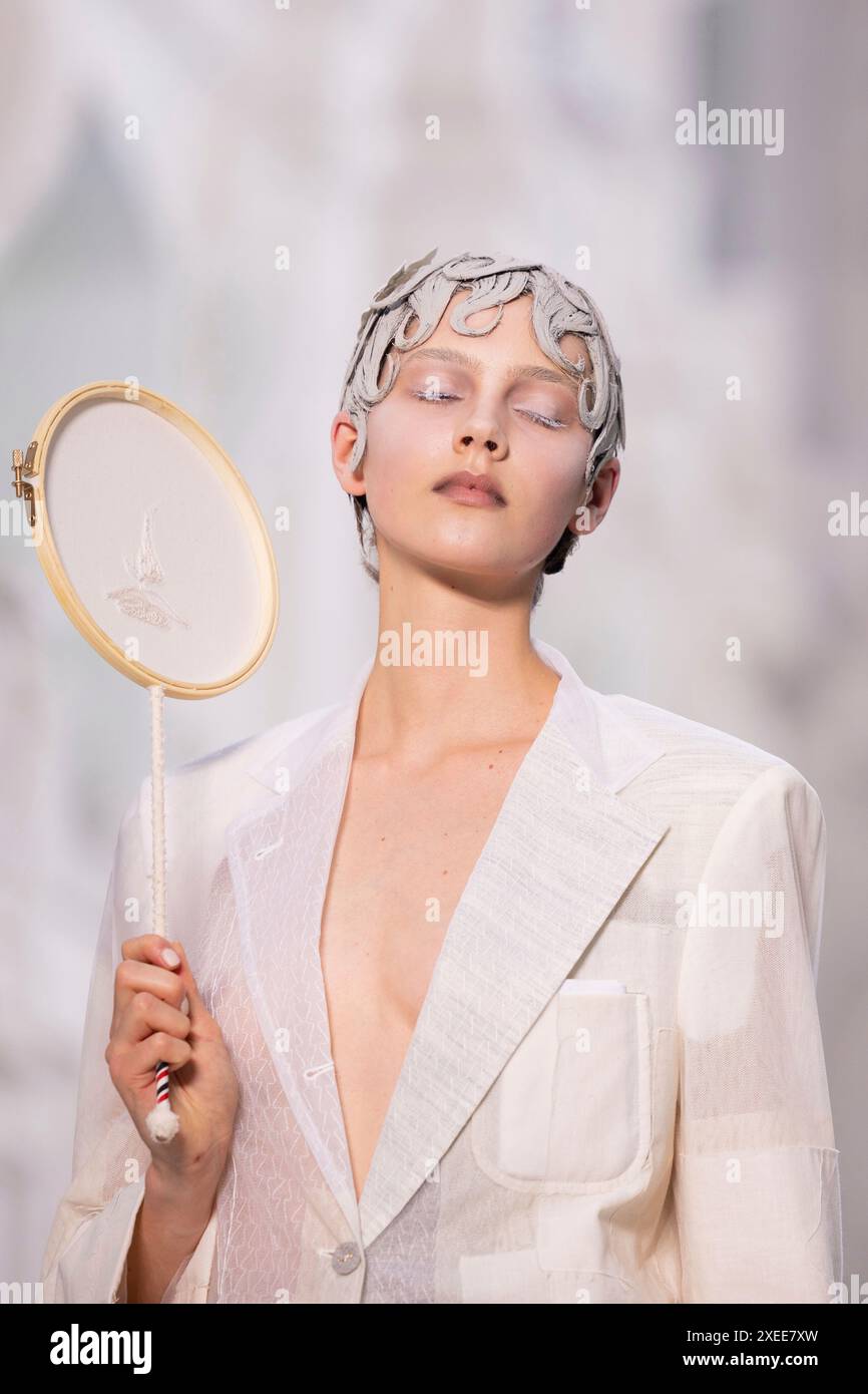A model wears a creation for the Thom Browne Haute Couture Fall-Winter ...