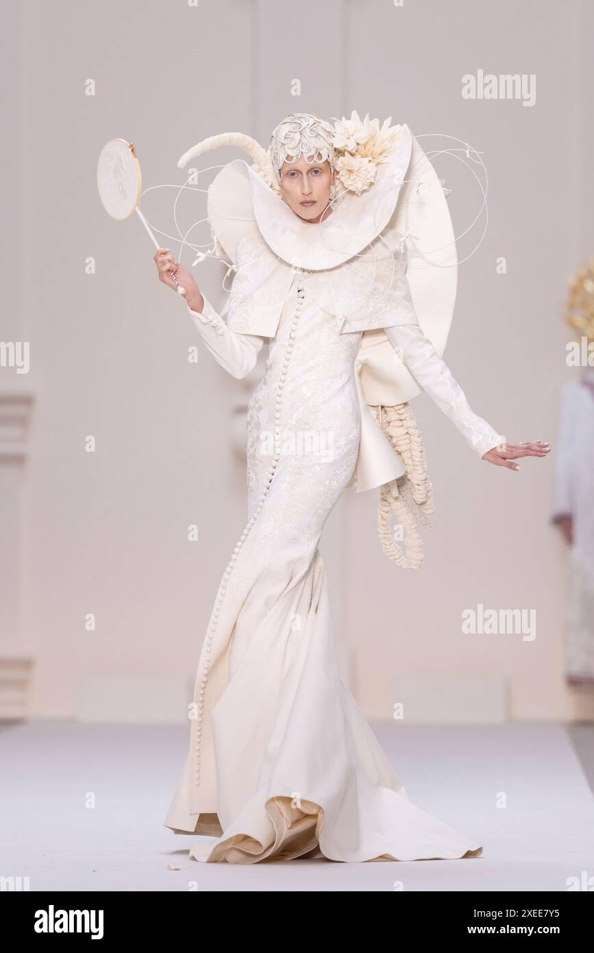 Anna Cleveland wears a creation for the Thom Browne Haute Couture Fall ...