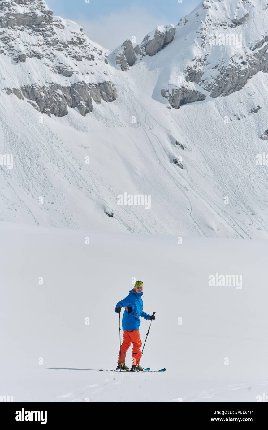A Skier Scales a Treacherous Alpine Peak Stock Photo - Alamy