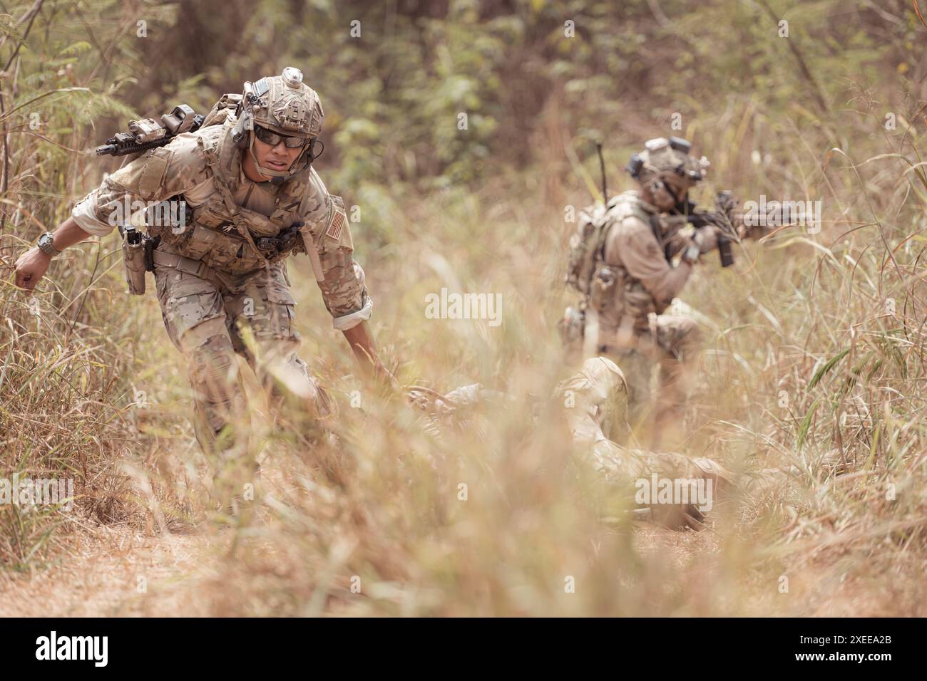 Soldiers in camouflage military uniforms carrying weapons, Reconnaissance missions in the ...