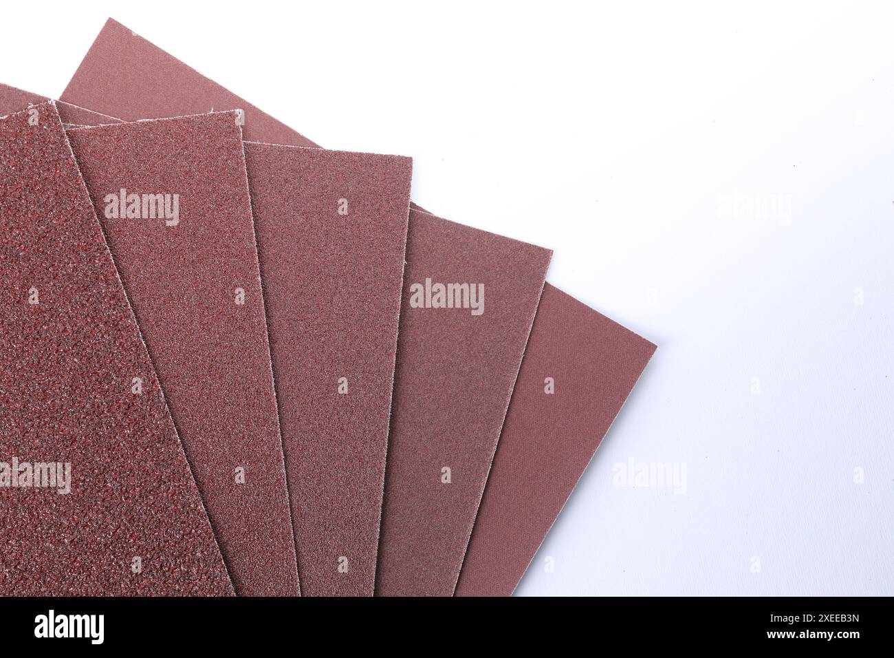 Sheets of sandpaper isolated on white, top view Stock Photo - Alamy