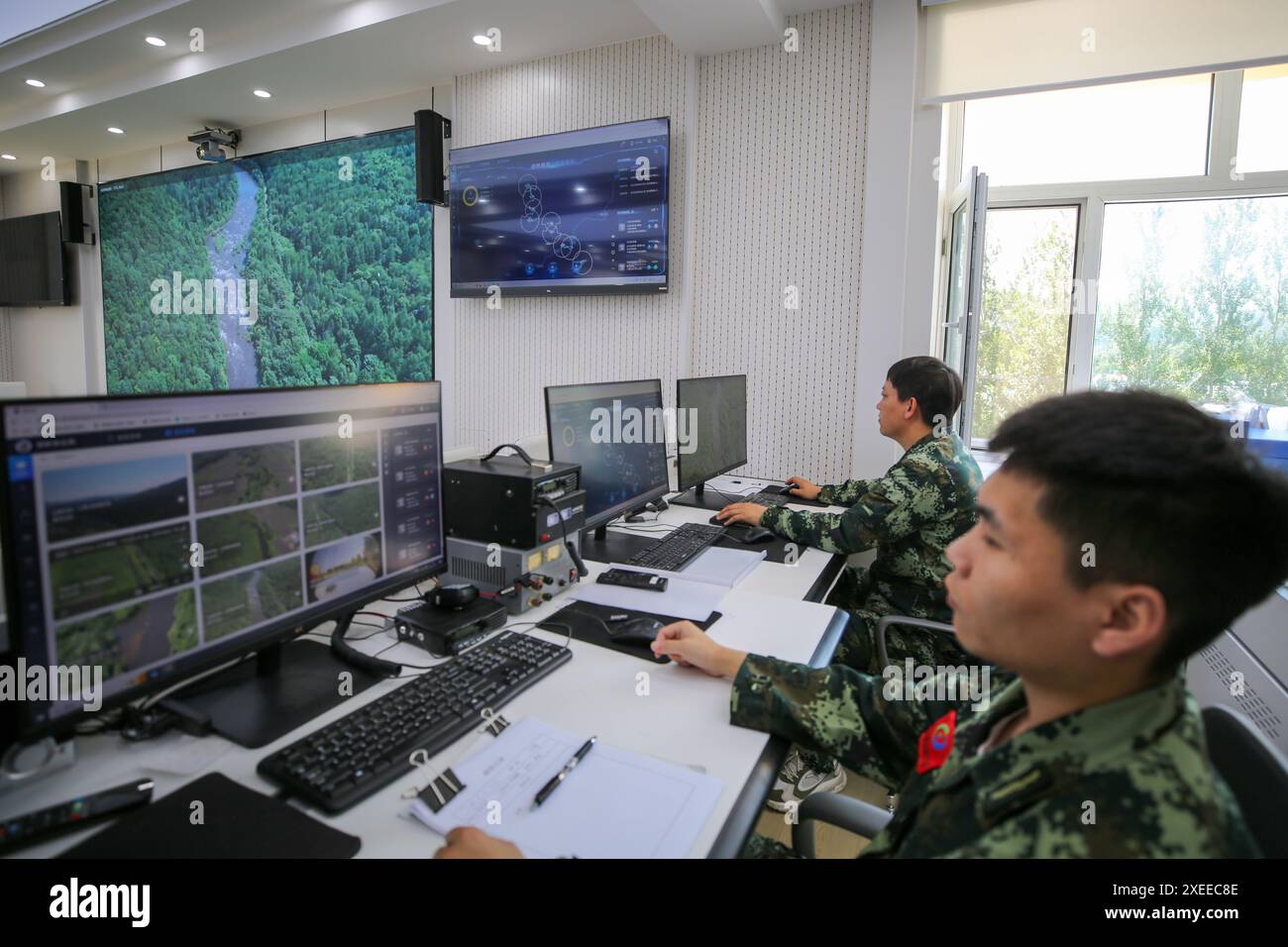 Yichun, China's Heilongjiang Province. 27th June, 2024. Staff members ...