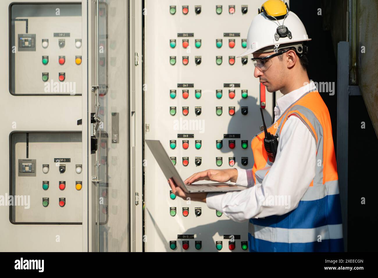 Before proceeding with the testing, Electrical engineer inspects the ...