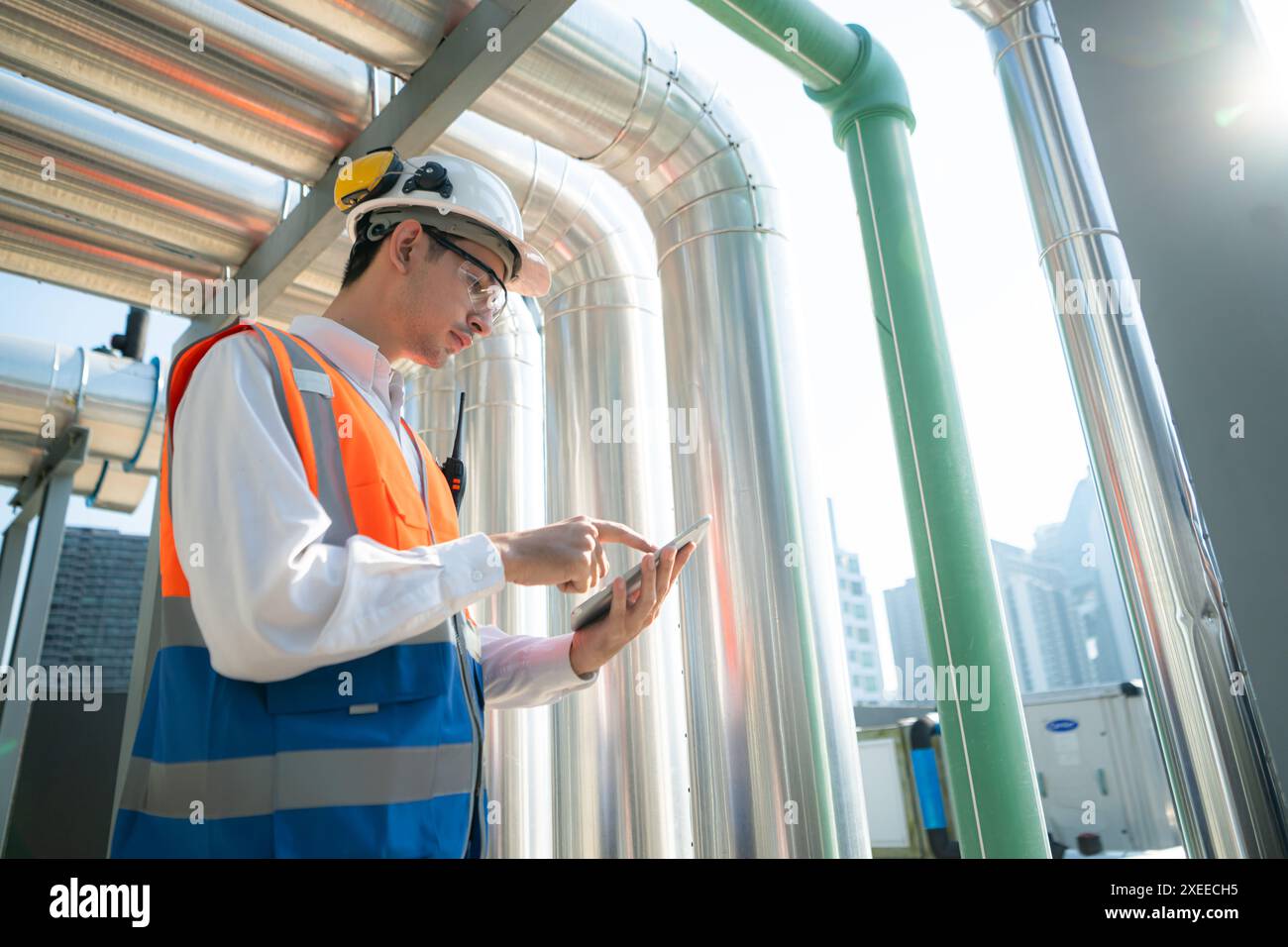 Engineers inspect the completed air conditioning and water systems to ...