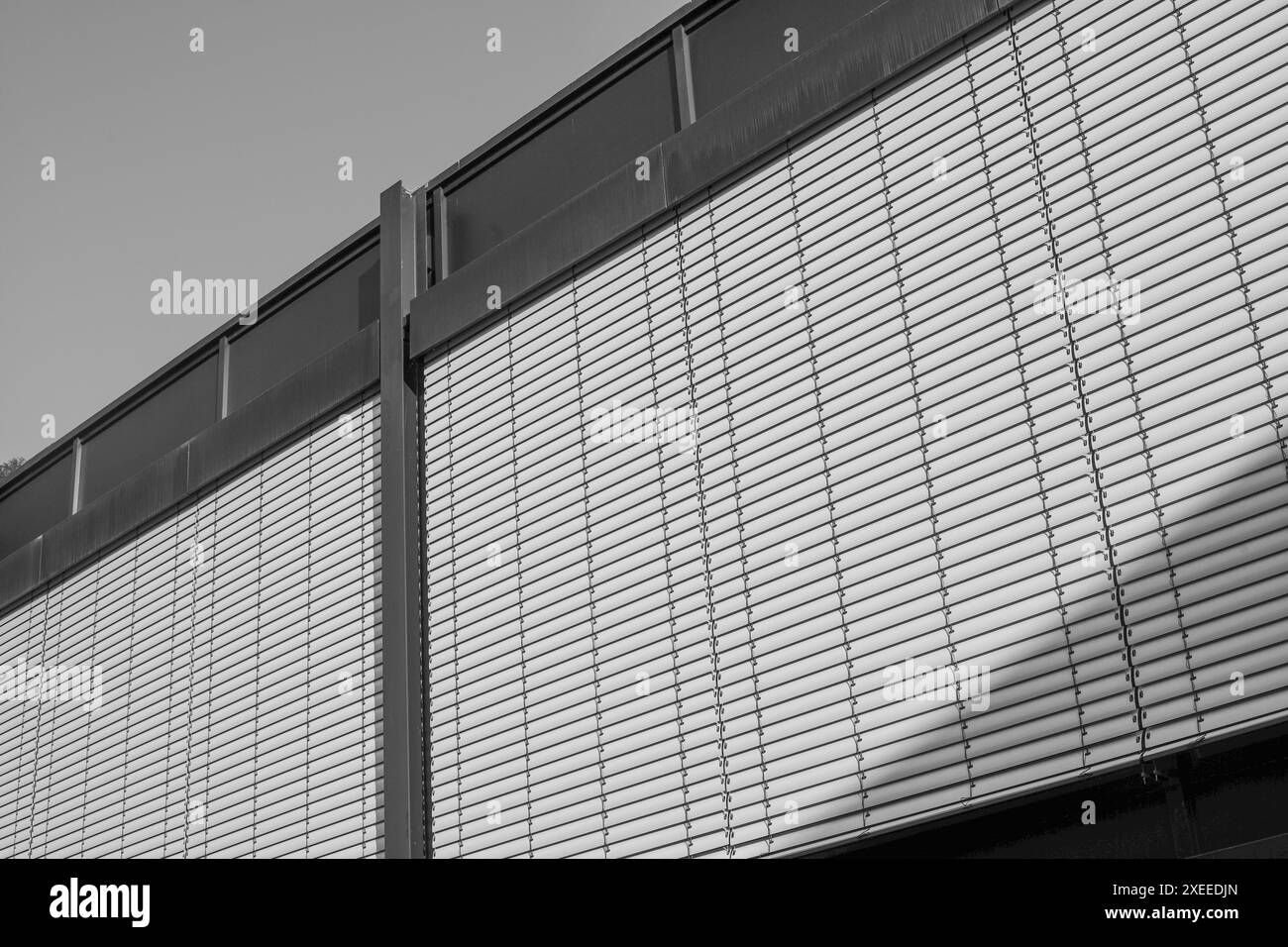 large building windows with blinds in the sun Stock Photo - Alamy