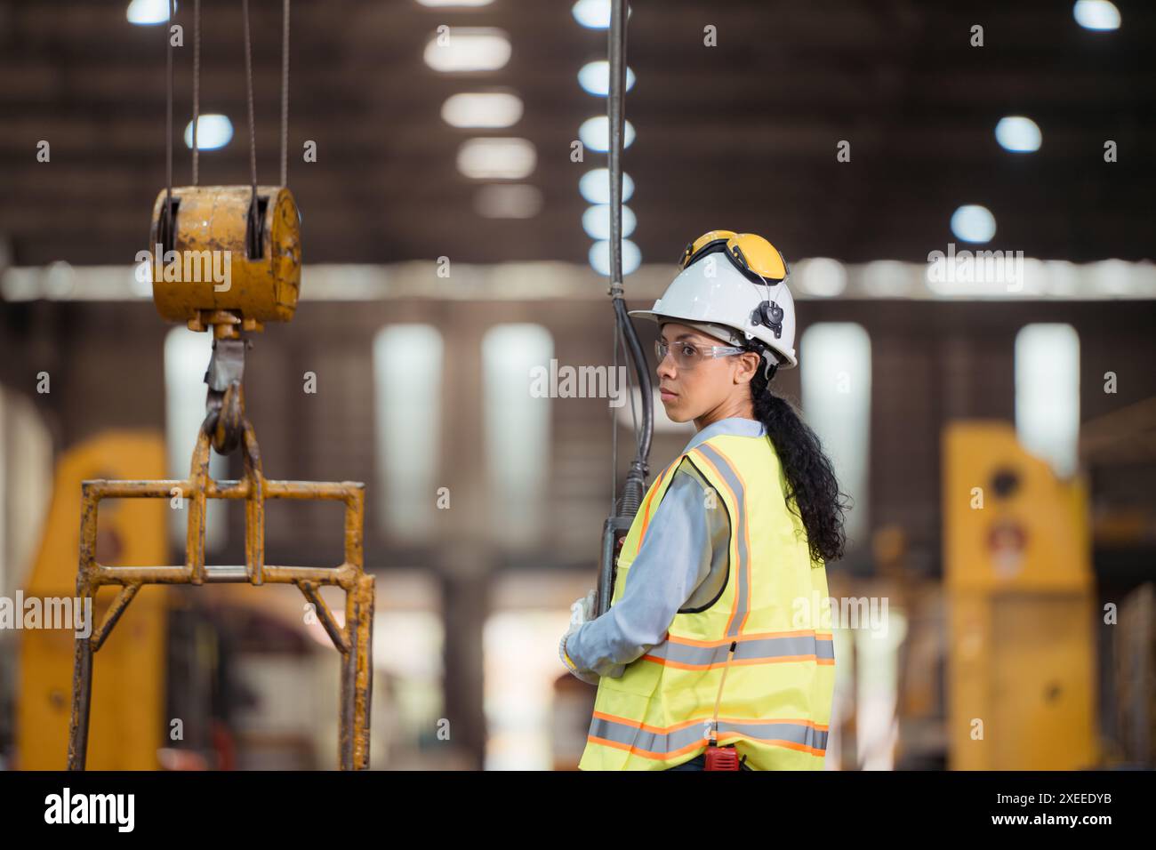 Portrait of railway technician worker in safety vest and helmet working ...