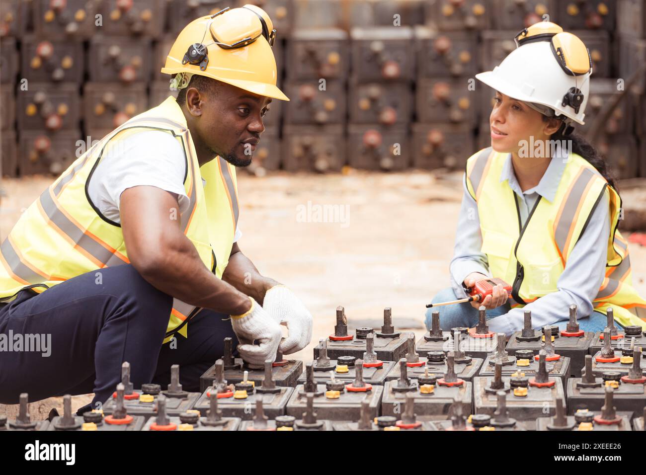 Railway technicians worker in safety vest and helmet inspect the ...